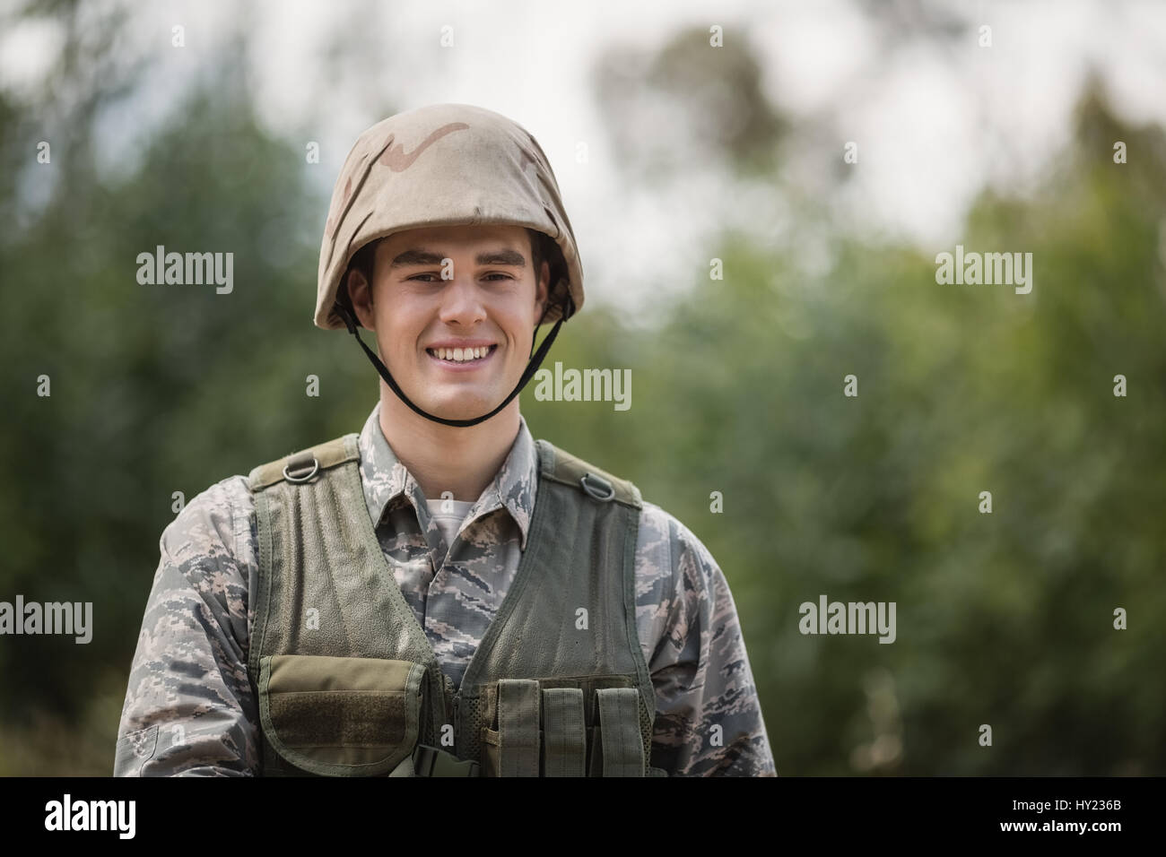 Portrait of smiling military soldier in boot camp Stock Photo - Alamy