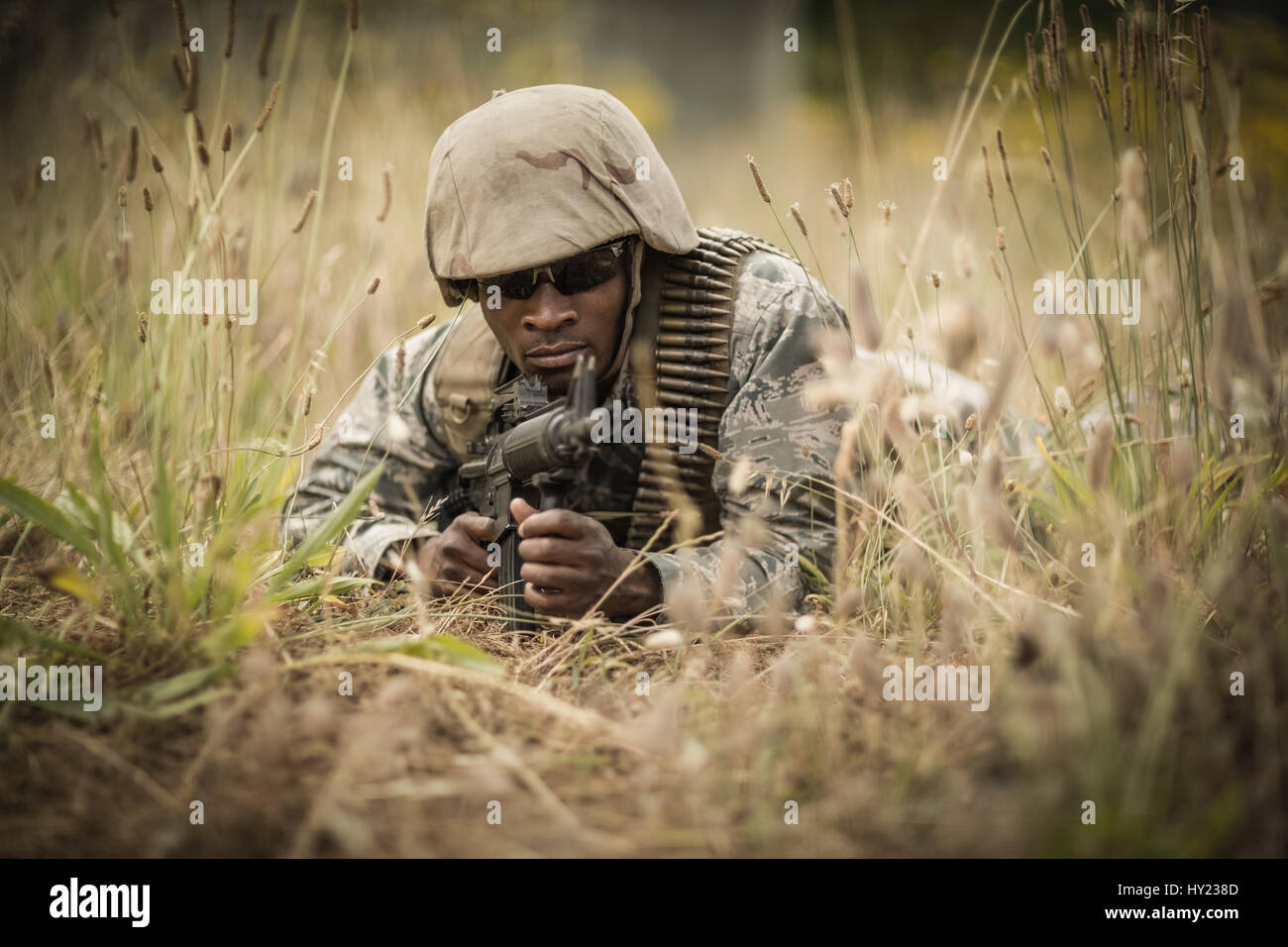 Military soldier guarding with a rifle in boot camp Stock Photo - Alamy