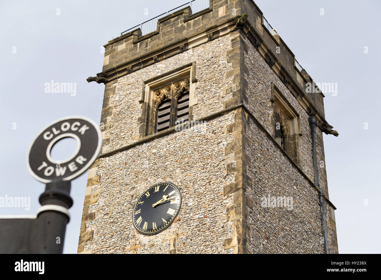 The Clock Tower and tourist signpost Stock Photo - Alamy