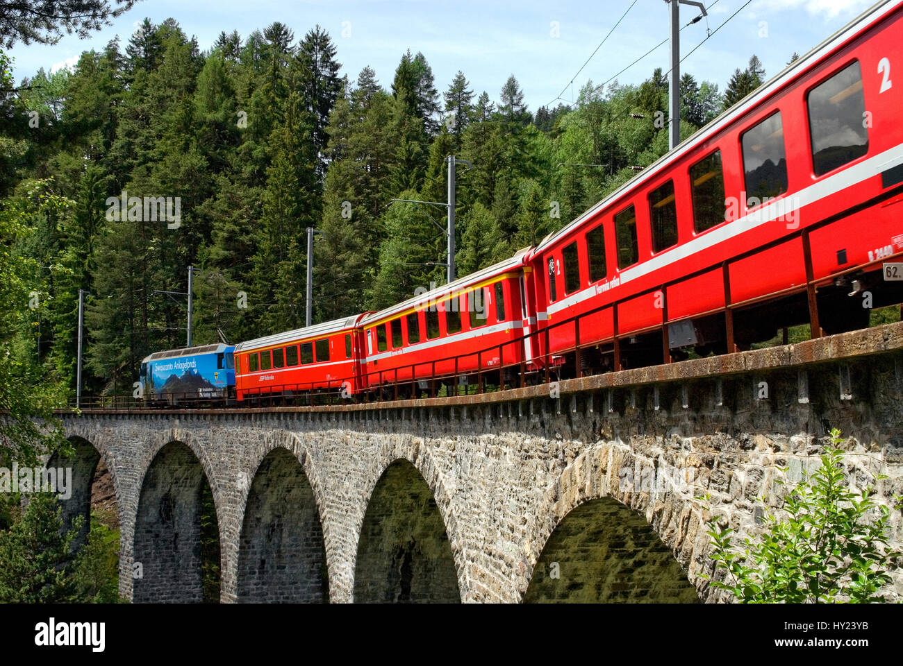 Alpine train at the Landwasser Viaduct in the Swiss Alps, Switzerland ...