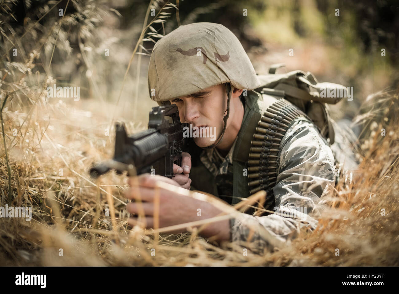 Military soldier aiming with a rifle in boot camp Stock Photo - Alamy