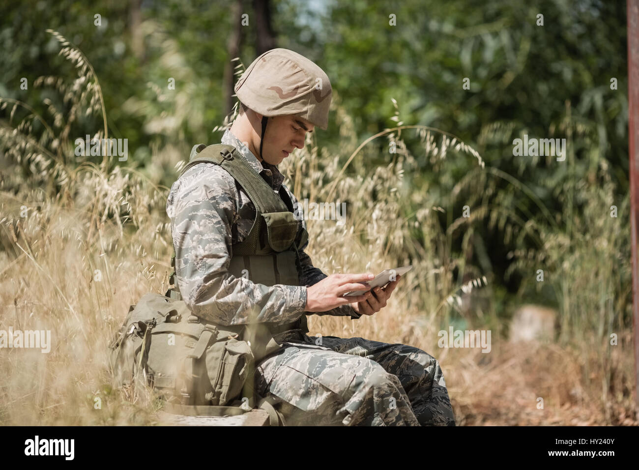 Army soldier military uniform holding sitting reading hi-res stock ...