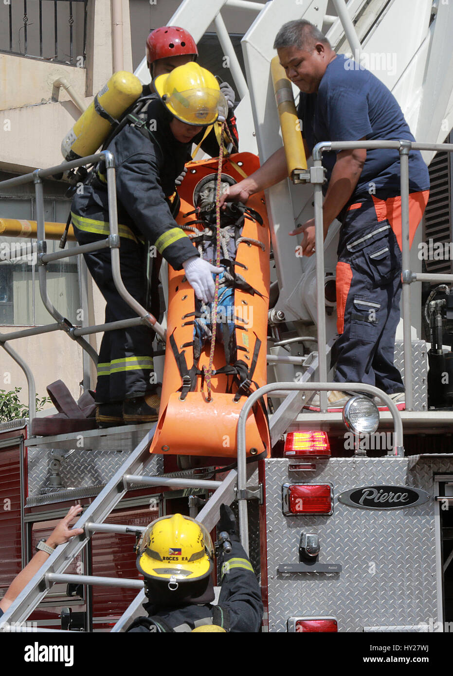 Quezon City, Philippines. 31st Mar, 2017. Firefighters save a dummy ...