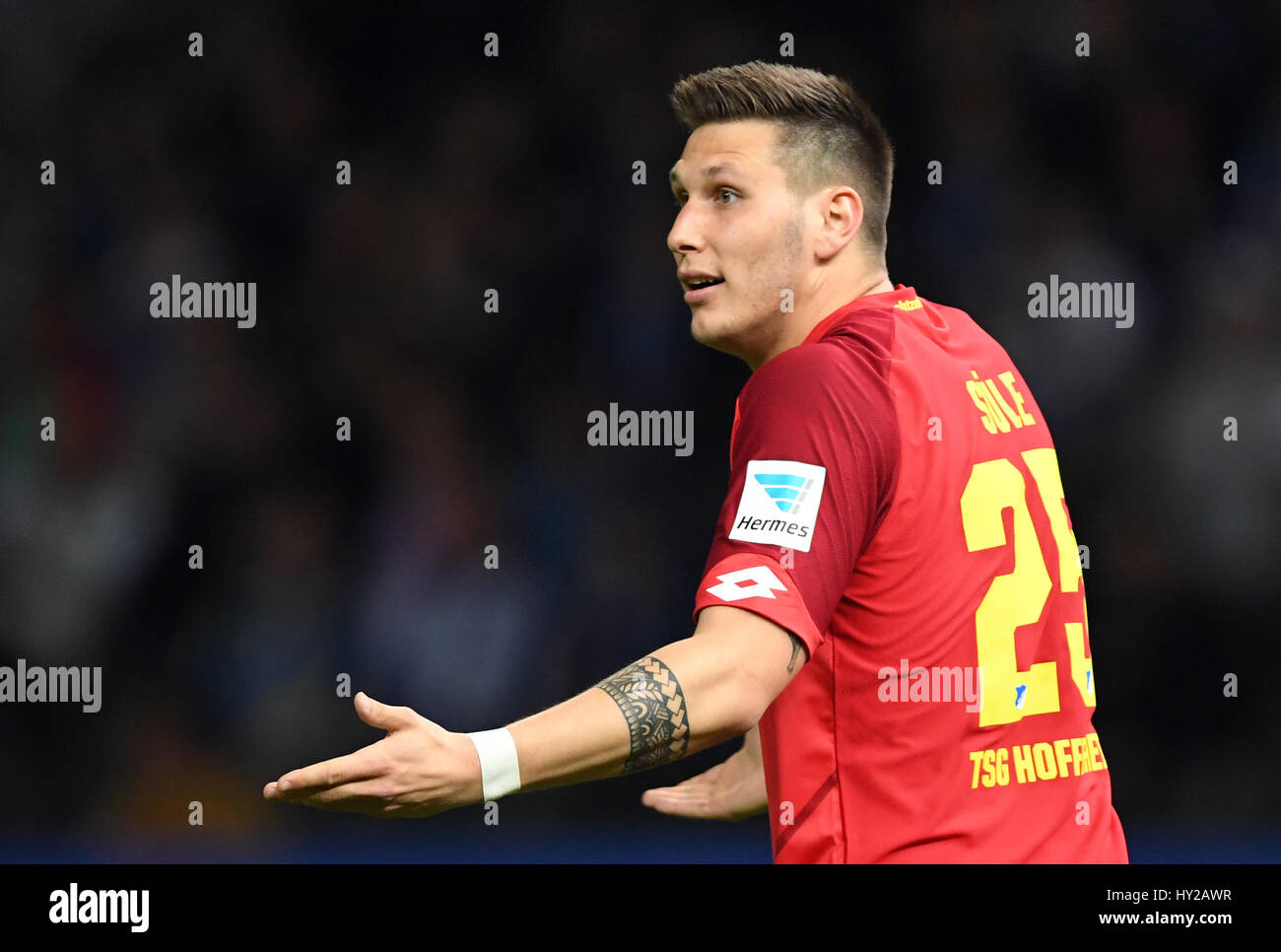 Berlin, Germany. 31st Mar, 2017. Hoffenheim's spreads his arms out ...