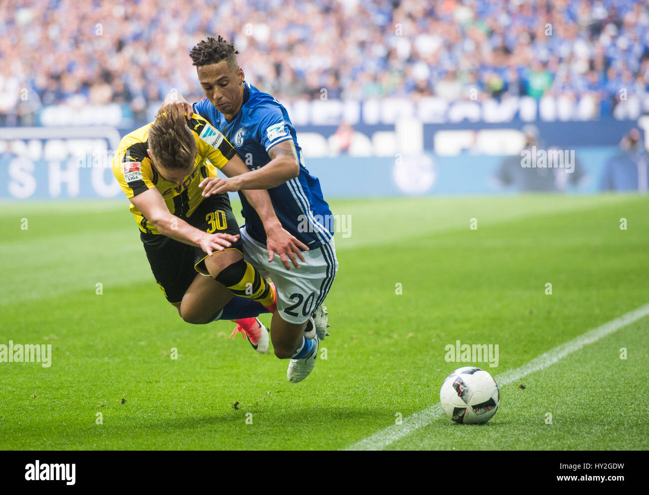 Schalke's Thilo Kehrer (r) and Felix Passlack from Dortmund in action ...