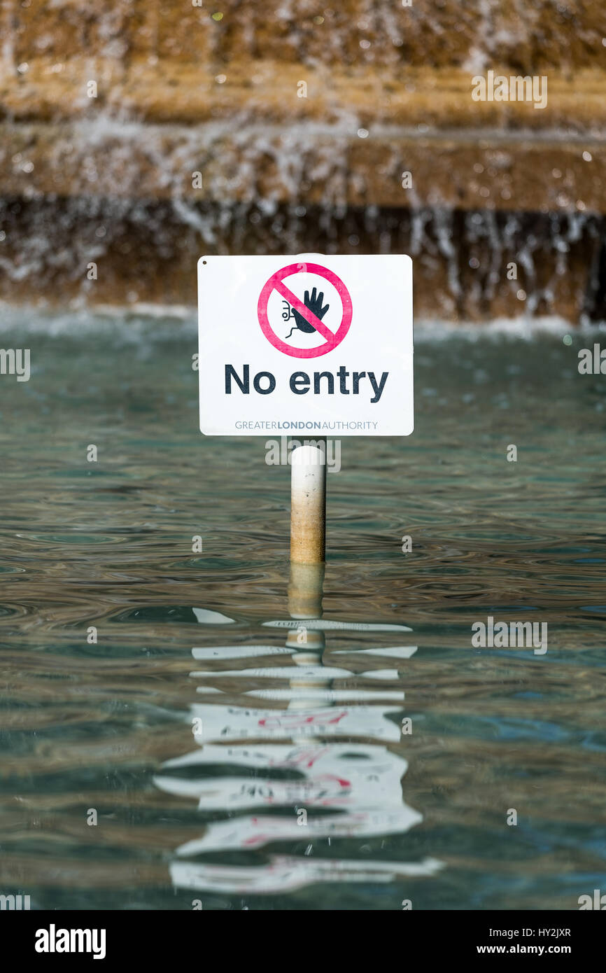 'No Entry' sign in a fountain at Trafalgar Square, London, England ...