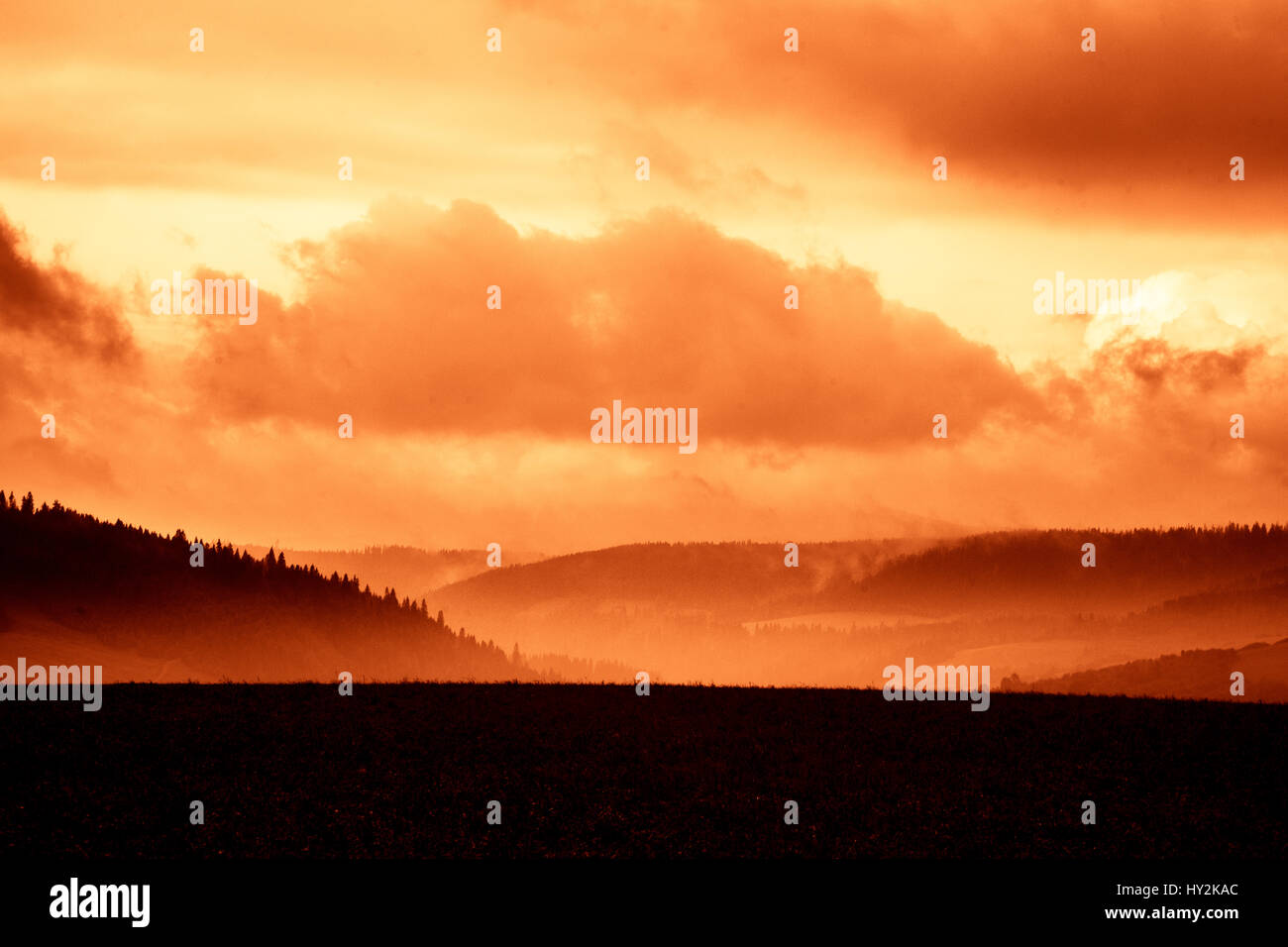 A beautiful, colorful, abstract mountain landscape in a red tonality ...