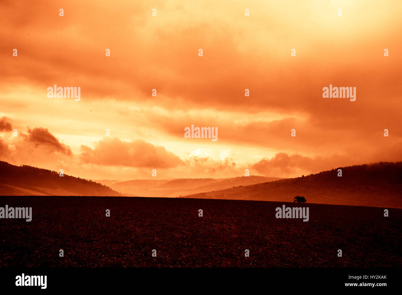 A beautiful, colorful, abstract mountain landscape in a red tonality ...