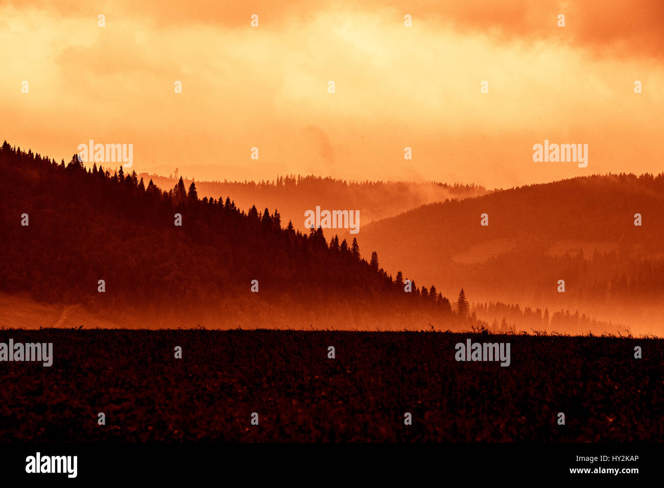 A beautiful, colorful, abstract mountain landscape in a red tonality ...