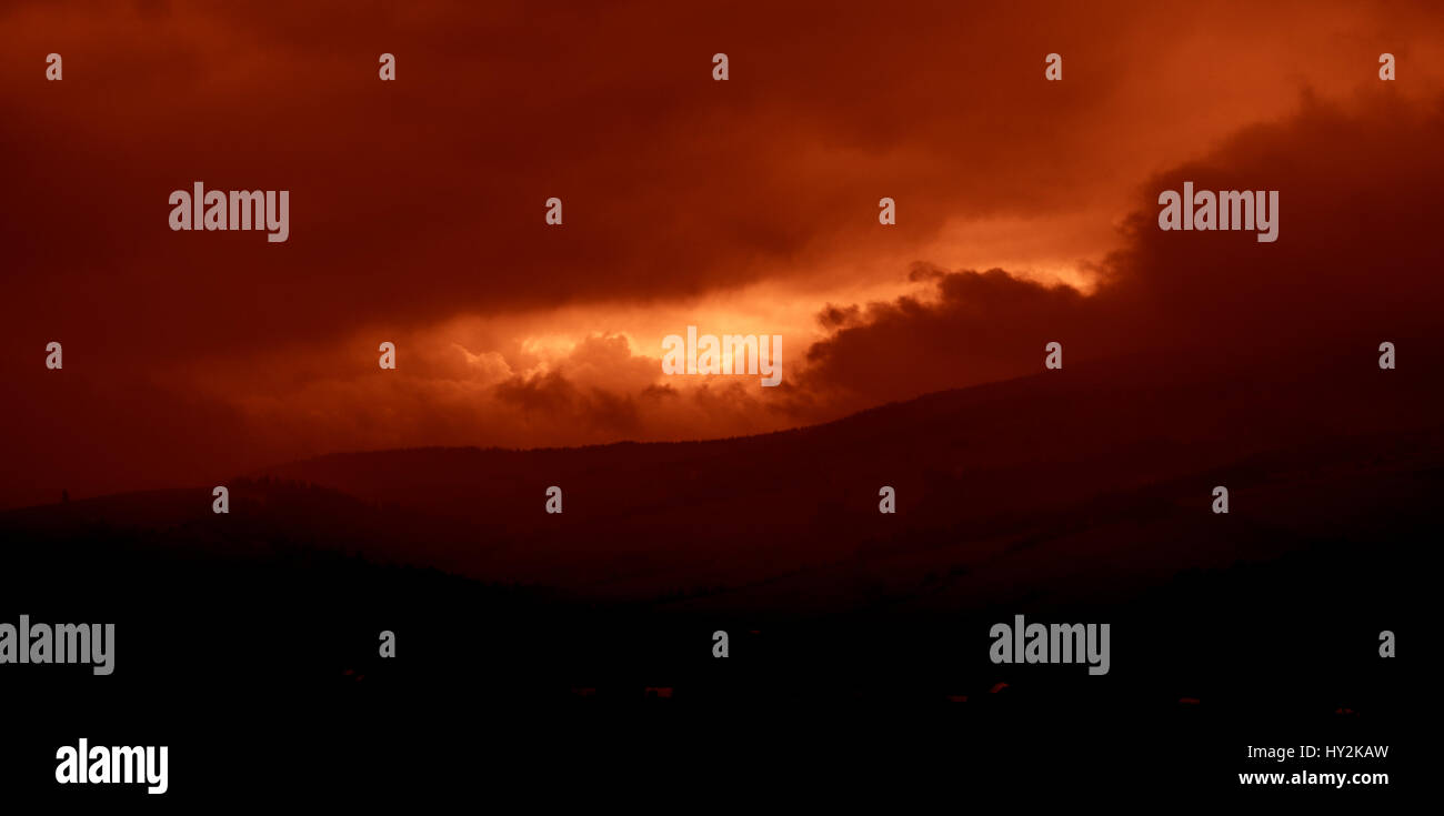 A beautiful, colorful, abstract mountain landscape in a red tonality ...