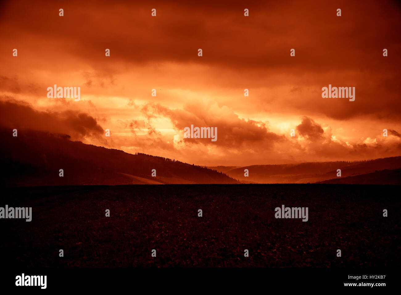 A beautiful, colorful, abstract mountain landscape in a red tonality ...