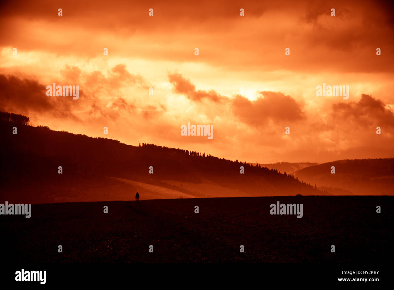 A beautiful, colorful, abstract mountain landscape in a red tonality ...