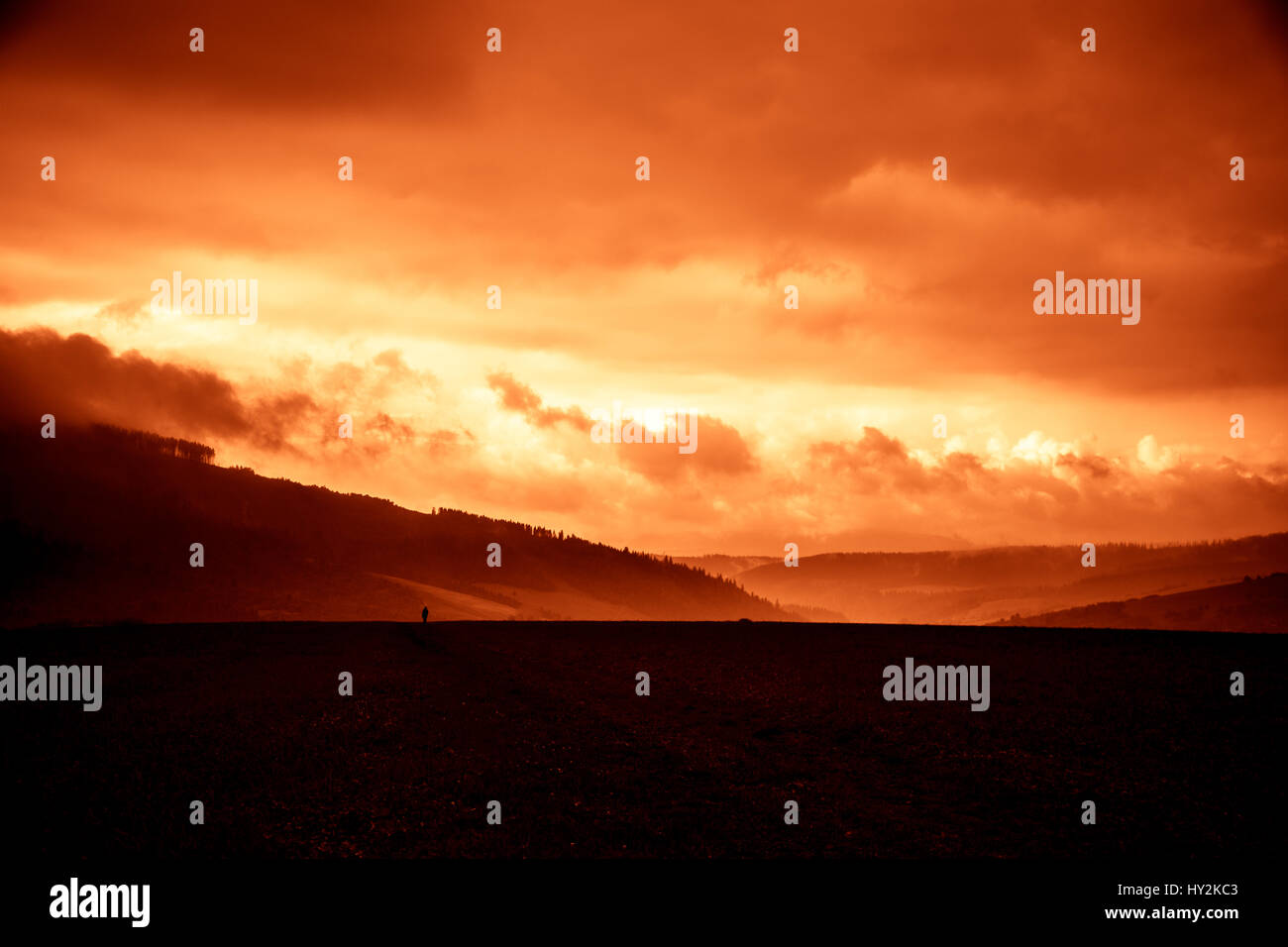 A beautiful, colorful, abstract mountain landscape in a red tonality ...