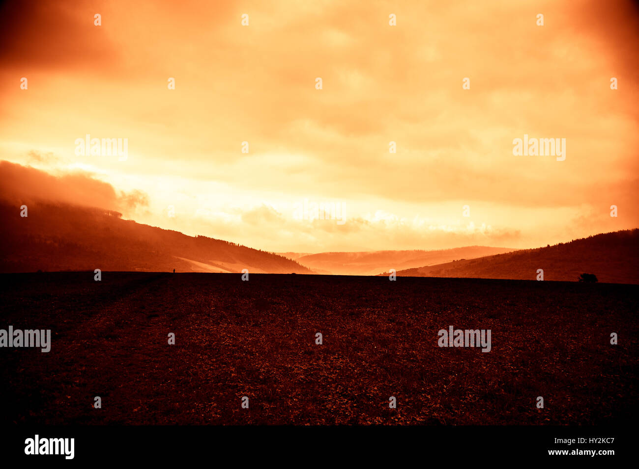 A beautiful, colorful, abstract mountain landscape in a red tonality ...