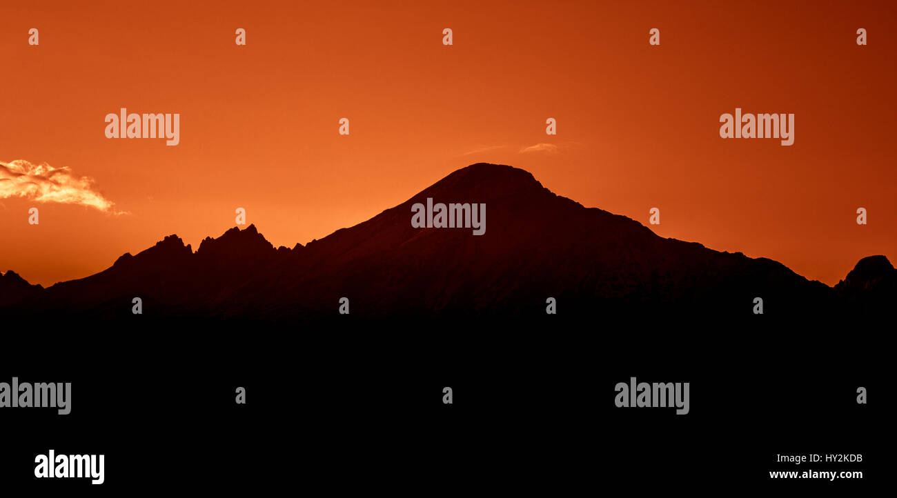 A beautiful, colorful, abstract mountain landscape in a red tonality ...