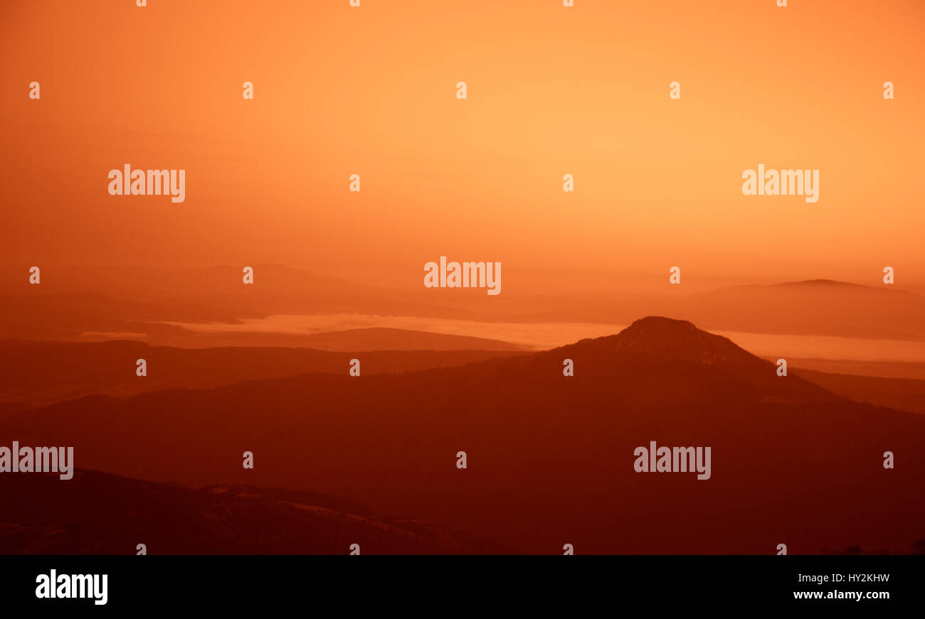 A beautiful, colorful, abstract mountain landscape in a red tonality ...