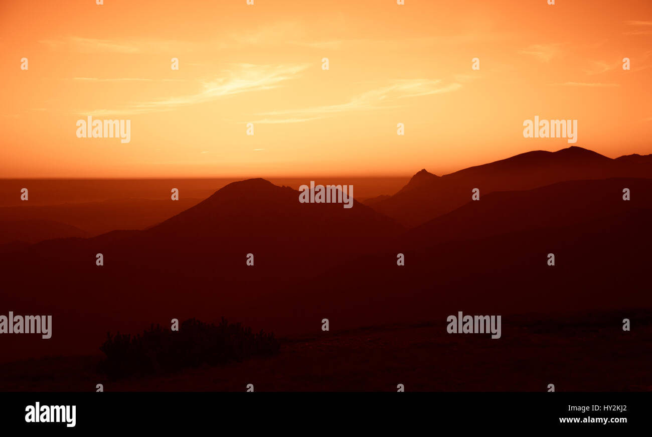 A beautiful, colorful, abstract mountain landscape in a red tonality ...