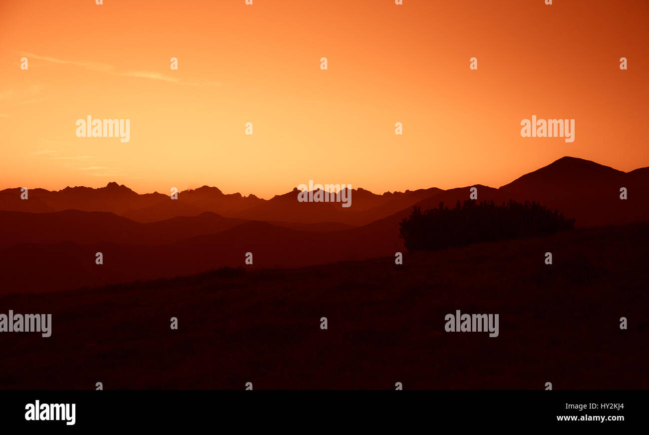 A beautiful, colorful, abstract mountain landscape in a red tonality ...