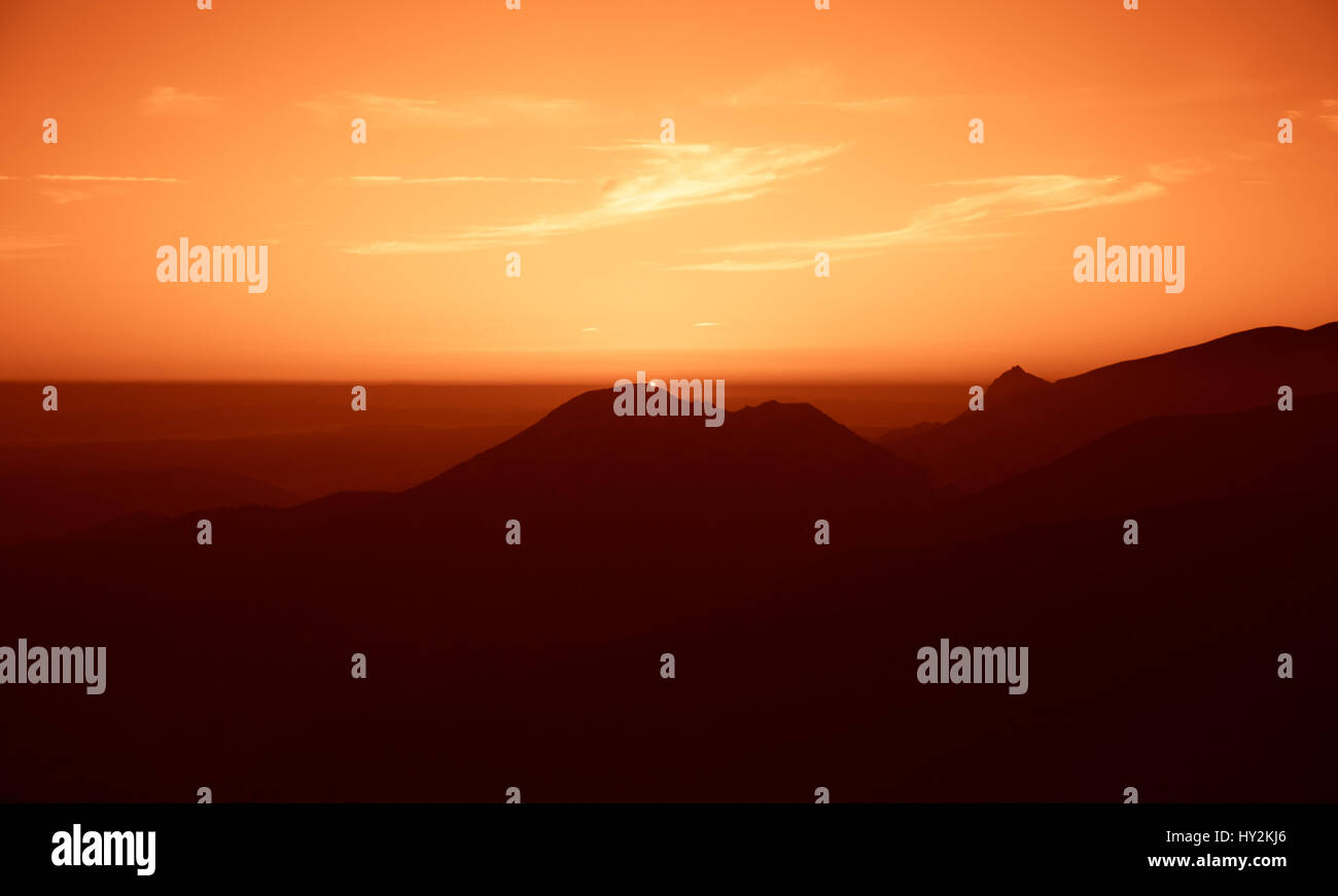 A beautiful, colorful, abstract mountain landscape in a red tonality ...