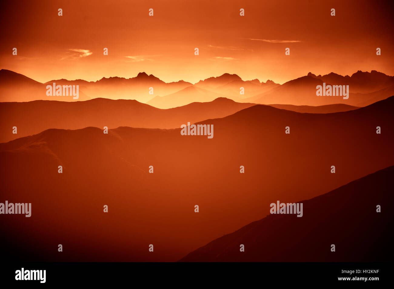 A beautiful, colorful, abstract mountain landscape in a red tonality ...