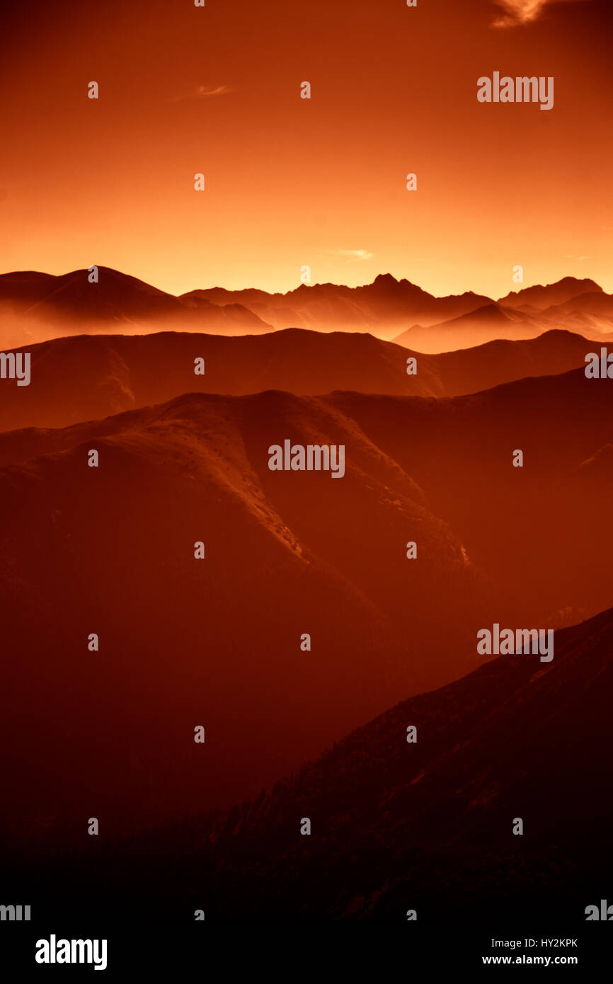 A beautiful, colorful, abstract mountain landscape in a red tonality ...