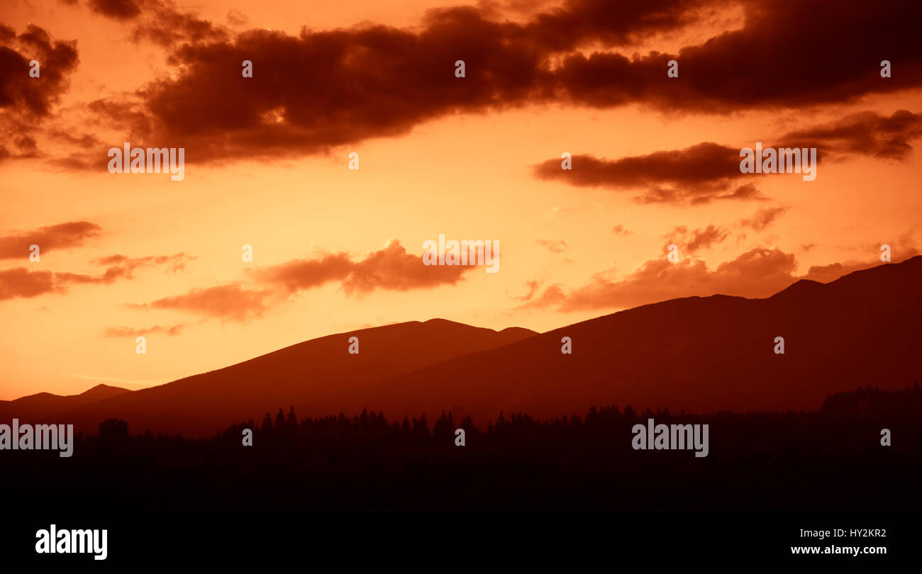 A beautiful, colorful, abstract mountain landscape in a red tonality ...