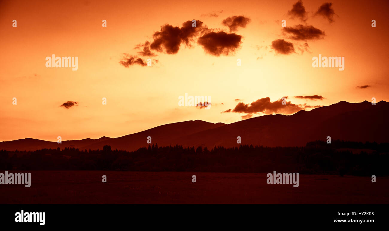 A beautiful, colorful, abstract mountain landscape in a red tonality ...