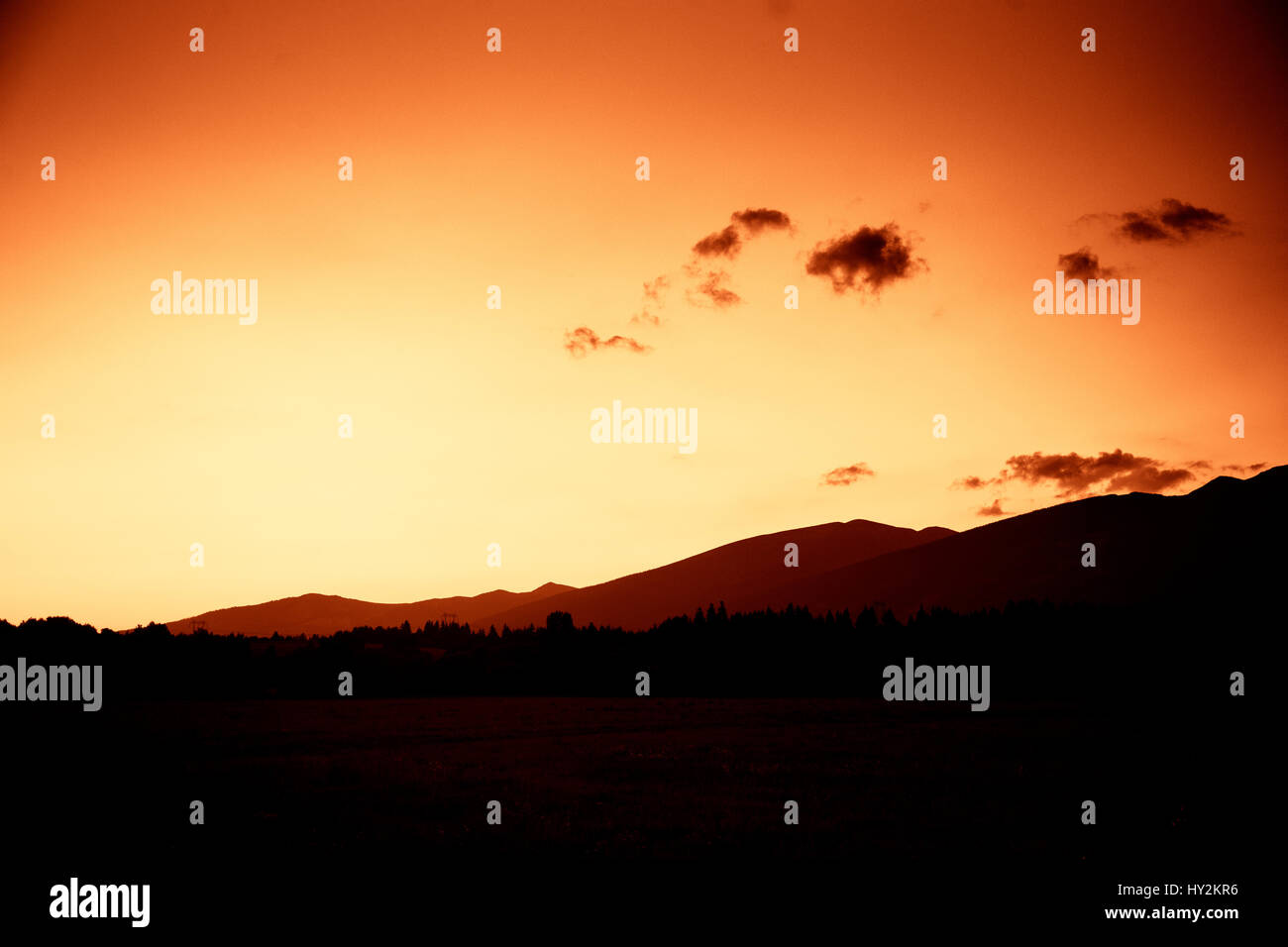 A beautiful, colorful, abstract mountain landscape in a red tonality ...