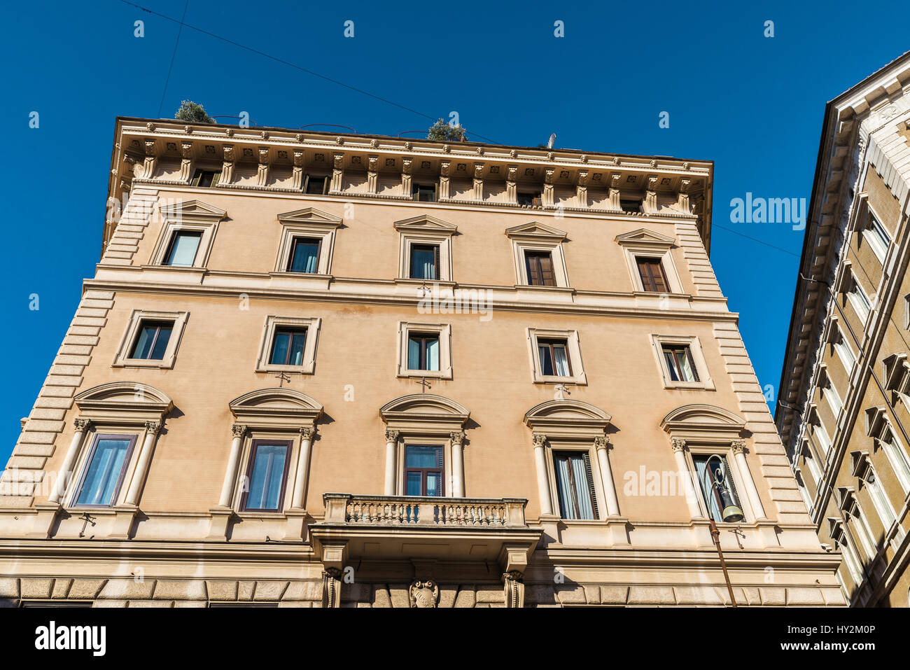 Facade of an old classic building in the historical center of Rome ...