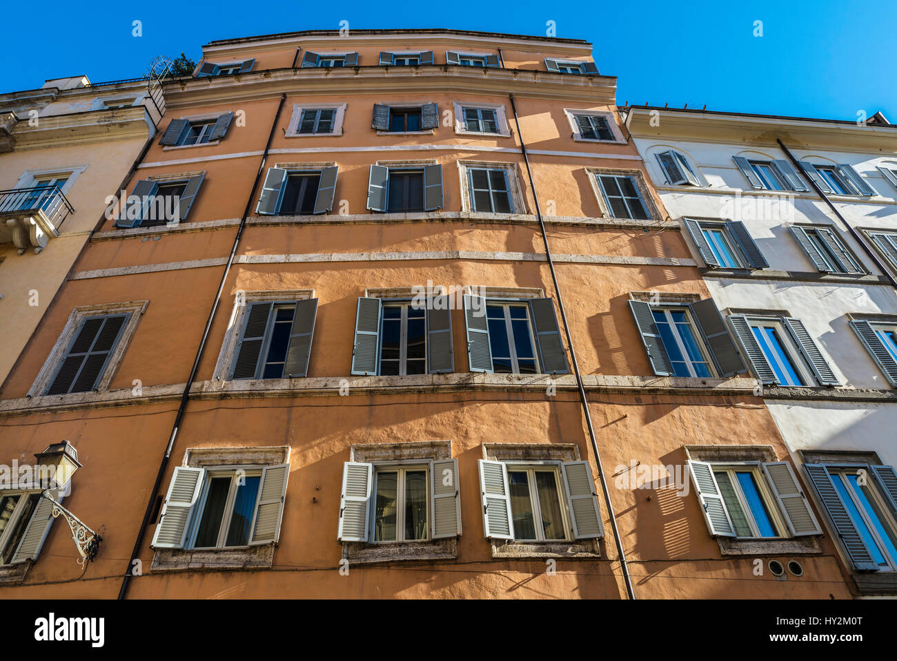 Facade of an old classic building in the historical center of Rome ...