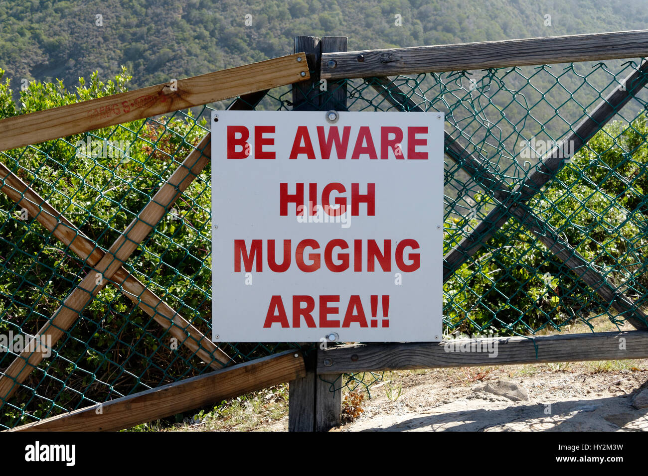 High mugging warning sign, Western Cape, South Africa Stock Photo - Alamy