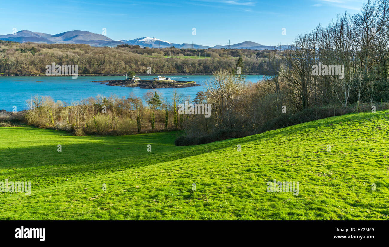 A view across the Menai Strait from a vantage point on Anglesey, with ...