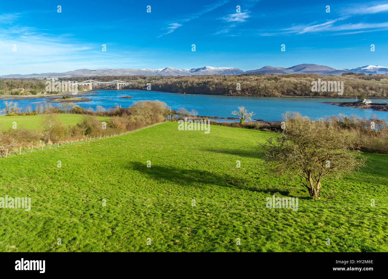 The Menai Strait with a view of the Menai Bridge from a vantage point ...