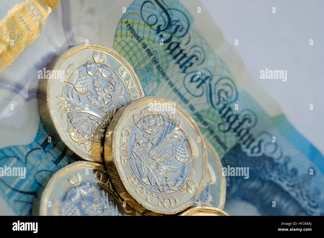 UK currency with new pound coin Stock Photo - Alamy
