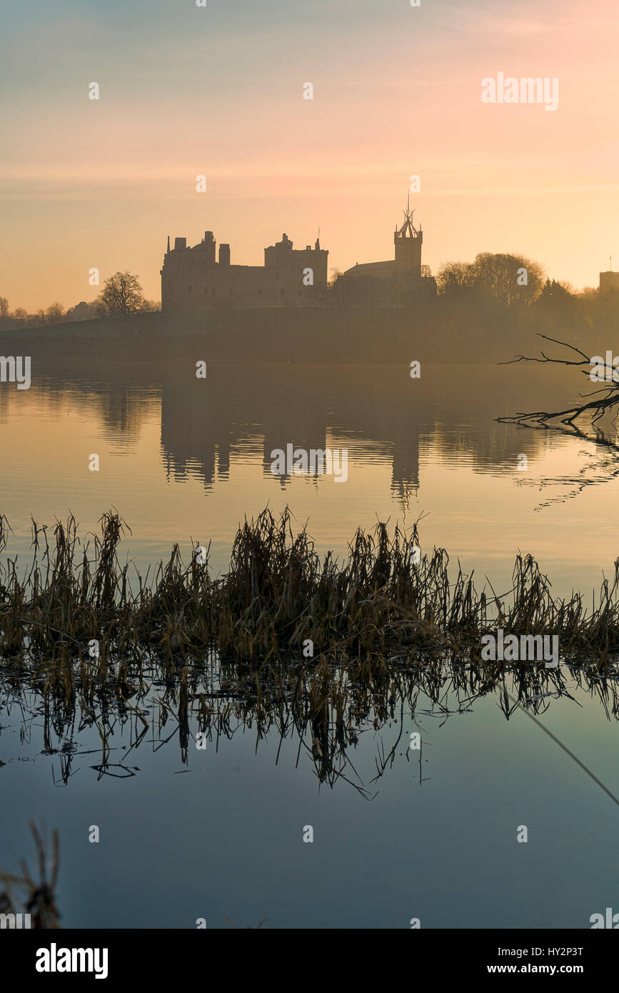 Misty morning sunrise Linlithgow loch, peel, palace, West Lothian ...