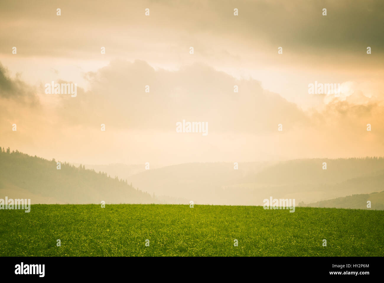 A beautiful, colorful, abstract mountain landscape with a hot summer ...