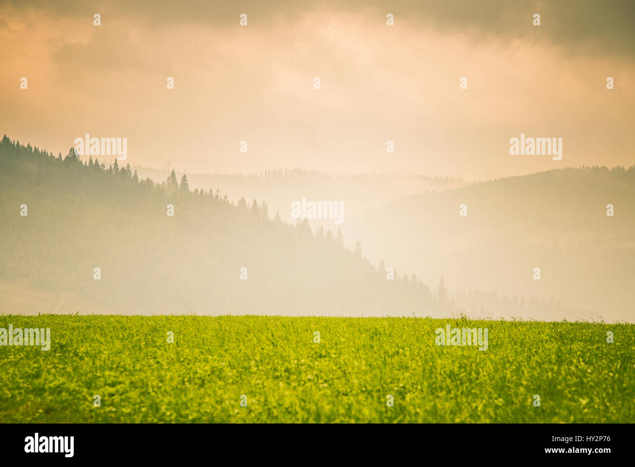 A beautiful, colorful, abstract mountain landscape with a hot summer ...