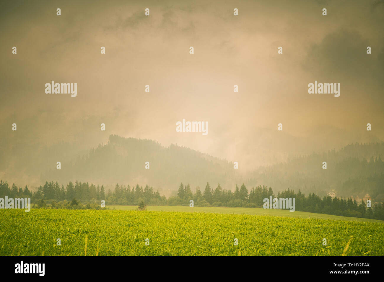 A beautiful, colorful, abstract mountain landscape with a hot summer ...