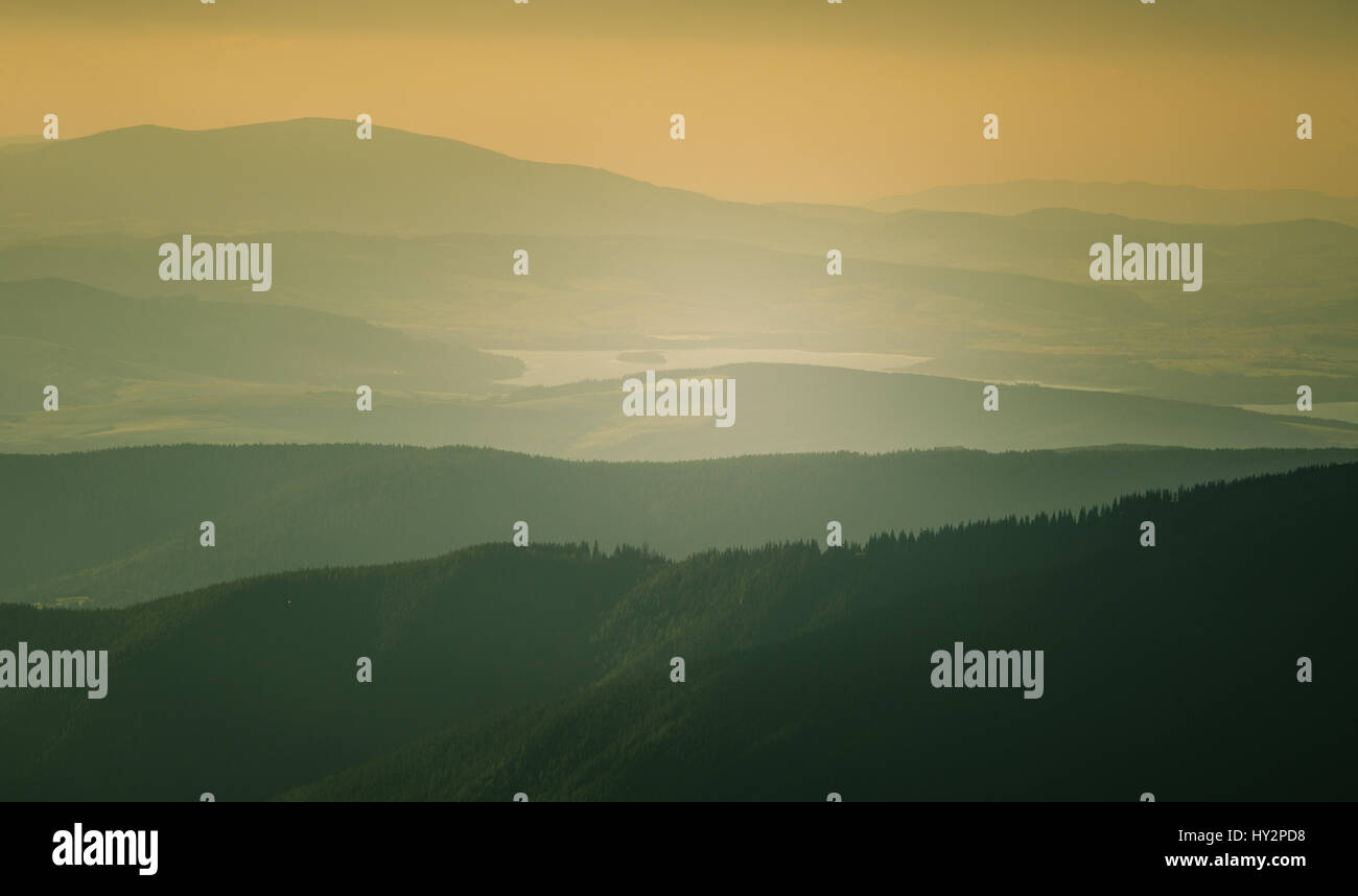 A beautiful, colorful, abstract mountain landscape with a hot summer ...