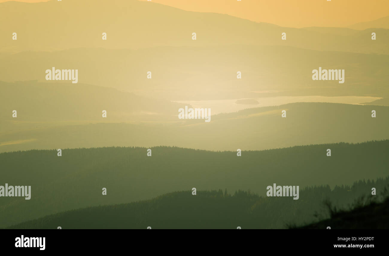 A beautiful, colorful, abstract mountain landscape with a hot summer ...