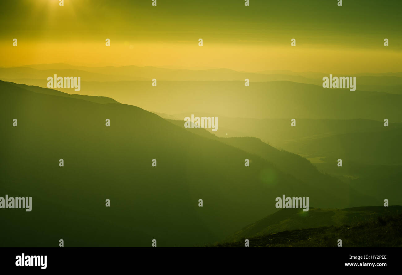 A beautiful, colorful, abstract mountain landscape with a hot summer ...