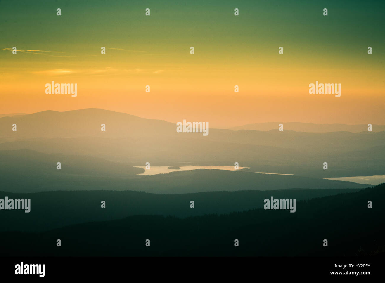 A beautiful, colorful, abstract mountain landscape with a hot summer ...