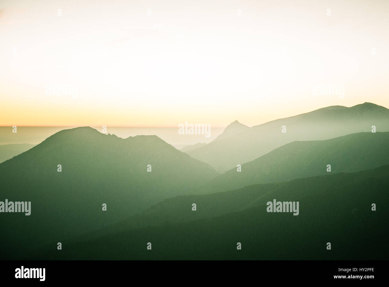 A beautiful, colorful, abstract mountain landscape with a hot summer ...