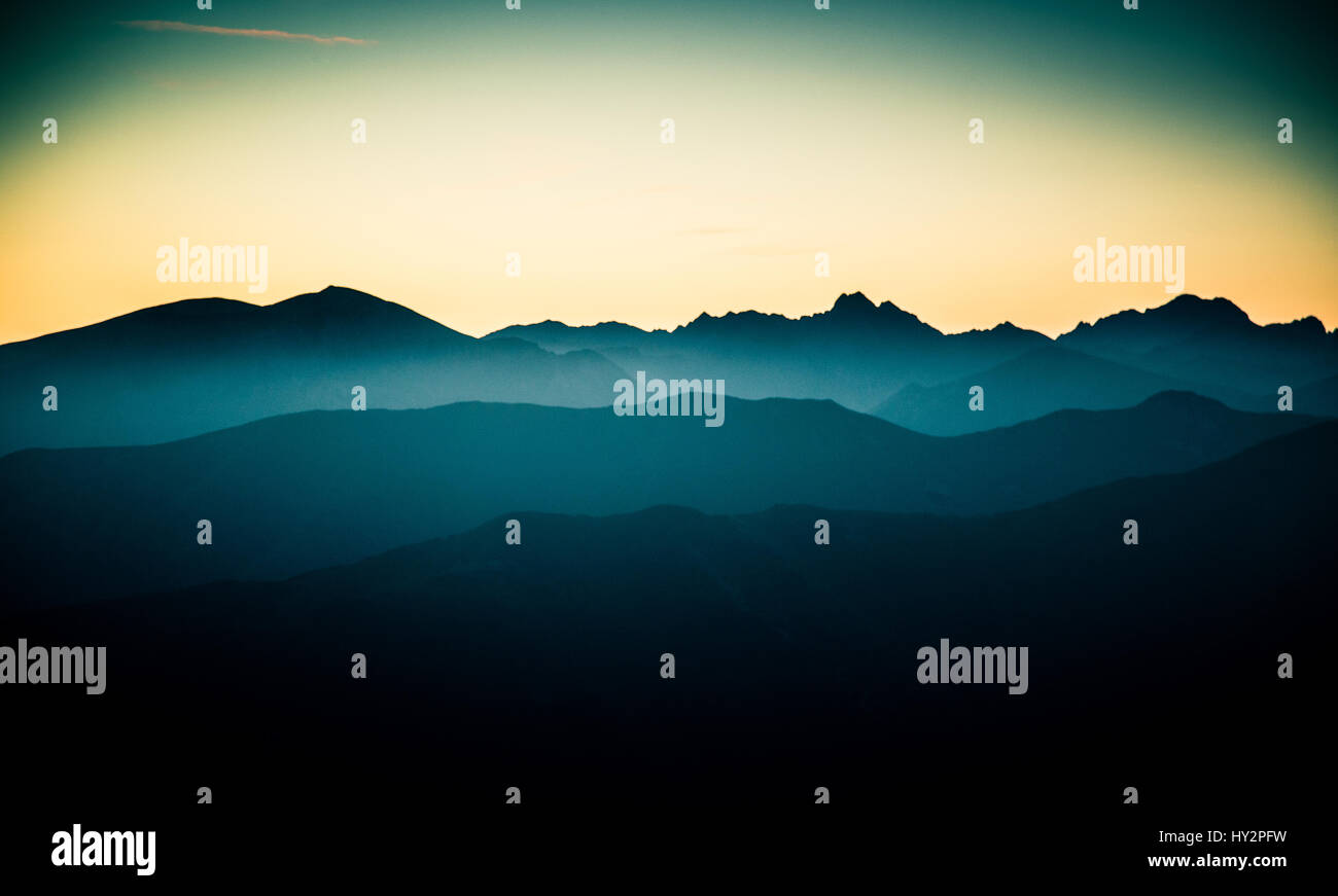 A beautiful, colorful, abstract mountain landscape with a hot summer ...