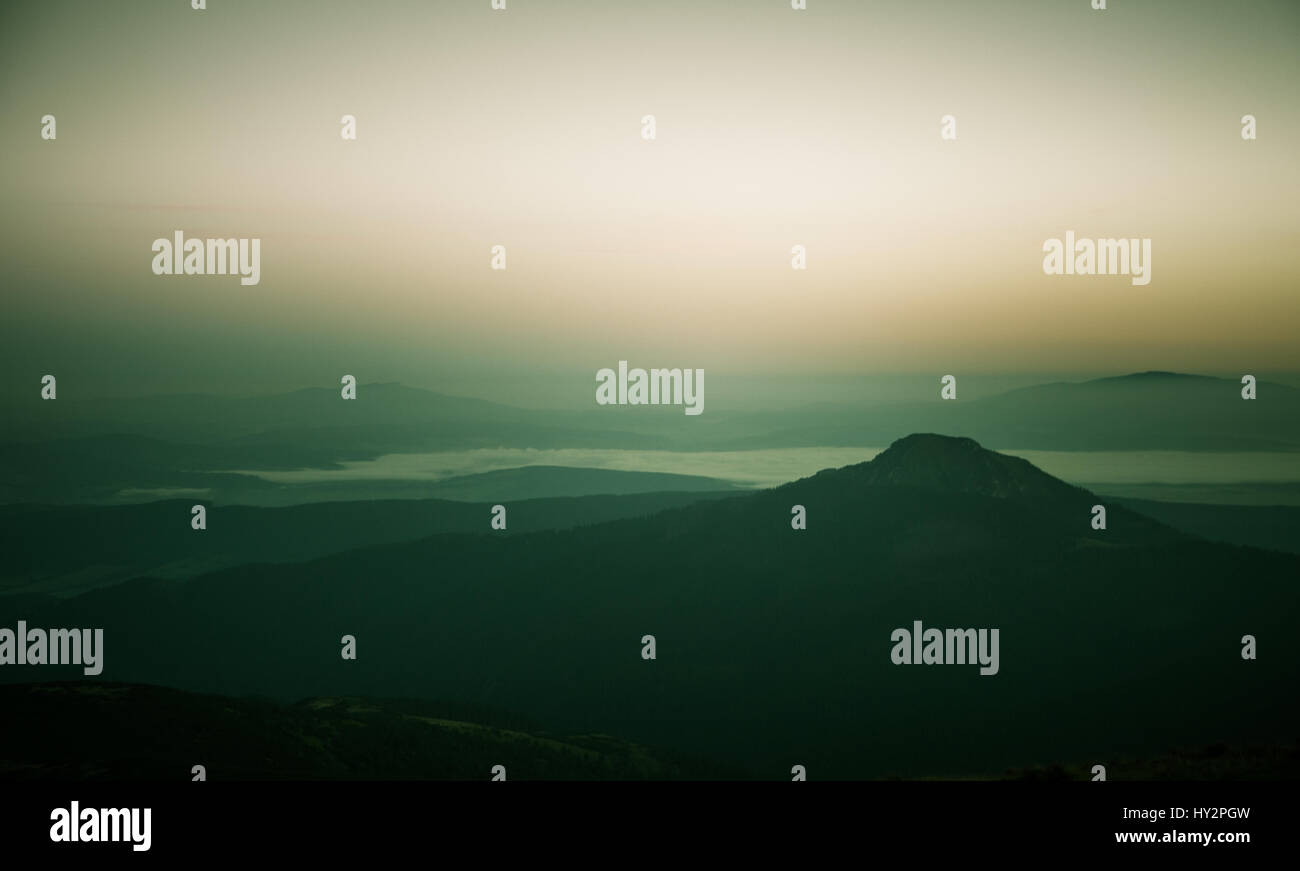 A beautiful, colorful, abstract mountain landscape with a hot summer ...