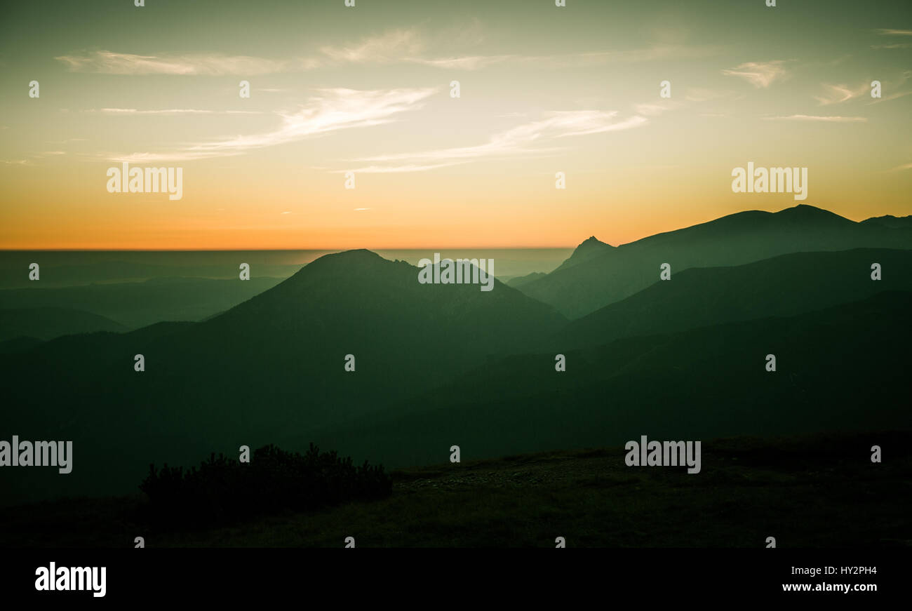 A beautiful, colorful, abstract mountain landscape with a hot summer ...