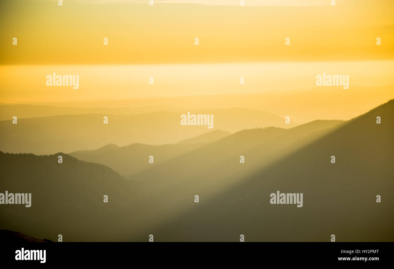 A beautiful, colorful, abstract mountain landscape with a hot summer ...