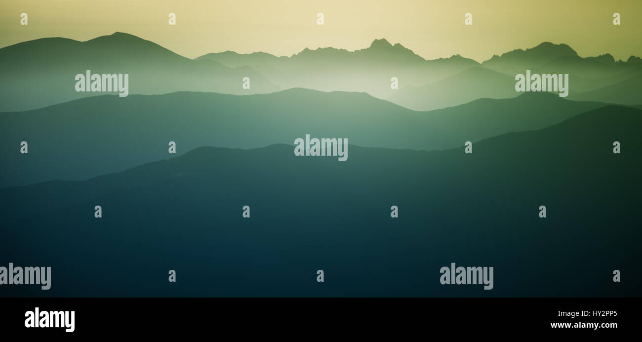 A beautiful, colorful, abstract mountain landscape with a hot summer ...