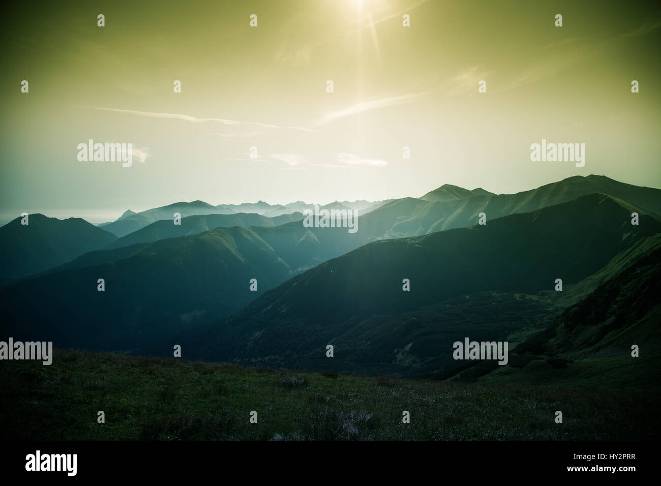 A beautiful, colorful, abstract mountain landscape with a hot summer ...