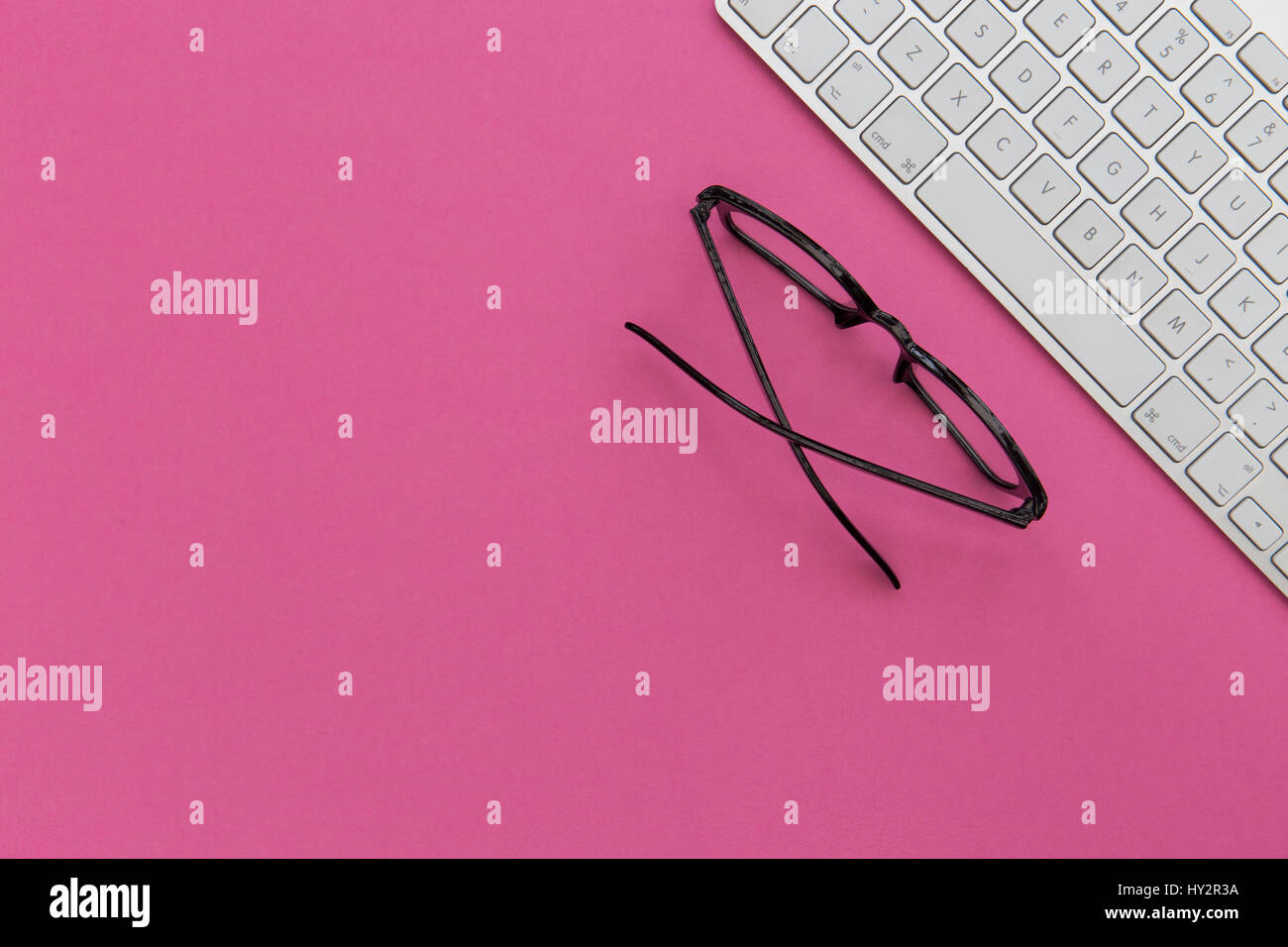 Overhead shot of glasses and computer Stock Photo - Alamy